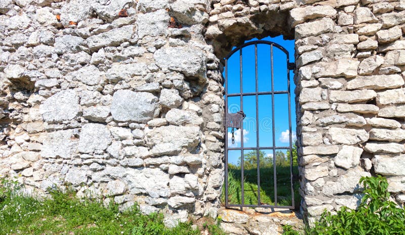 Stone Castle Wall with a Metal Passage To the Courtyard Stock Photo ...