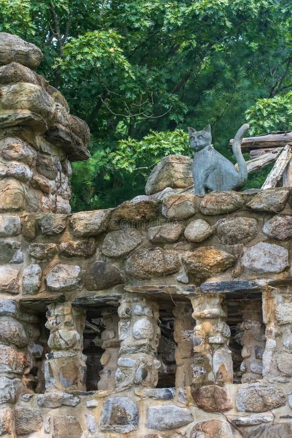 Stone Cat Sculpture on Stone Wall Stock Photo - Image of monument ...