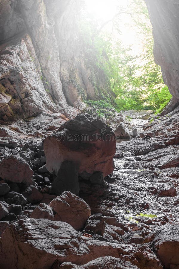 Stone Cave Inside View. Light Exit Stock Photo - Image of caving, risk ...