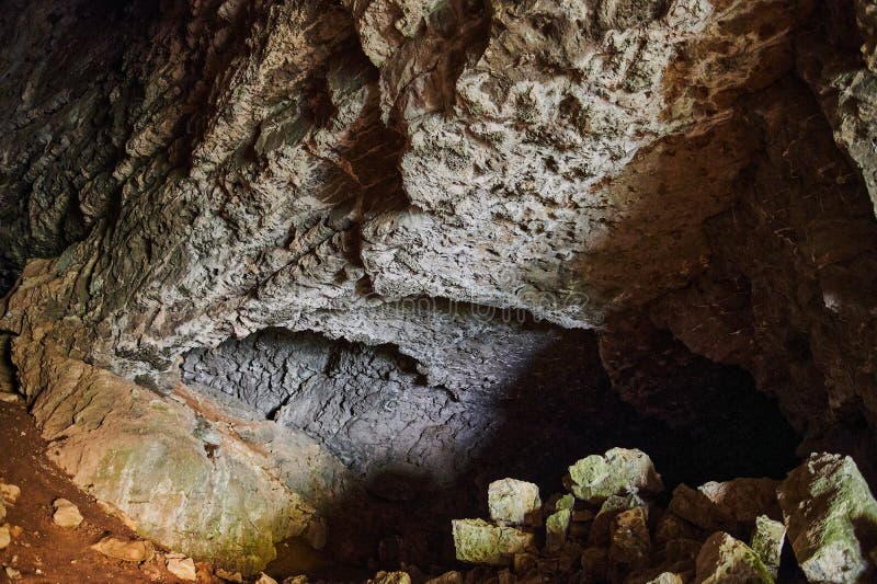 Stone Cave Inside. View Near the Entrance. Stock Photo - Image of ...