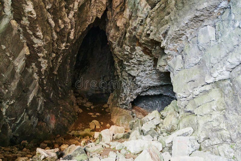 Stone Cave Inside. View Near the Entrance. Stock Image - Image of ...