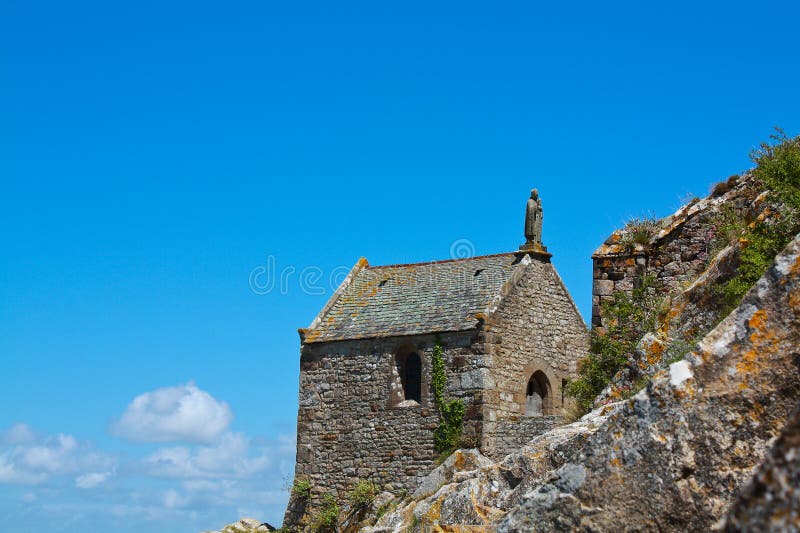 Stone Chapel with a Saint on the Roof Stock Photo - Image of michel ...