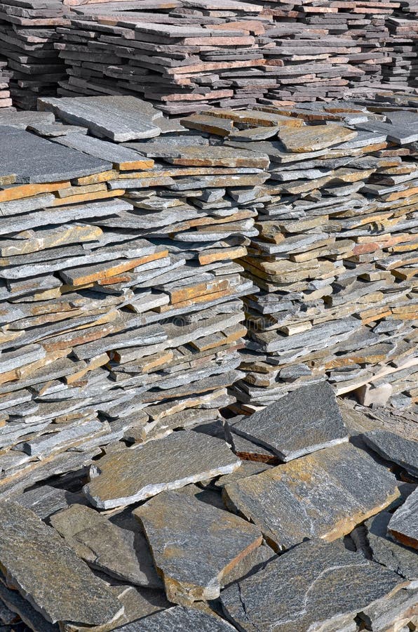 Stone Cladding Wall Made of Striped Stacked Slabs of Natural Rocks ...