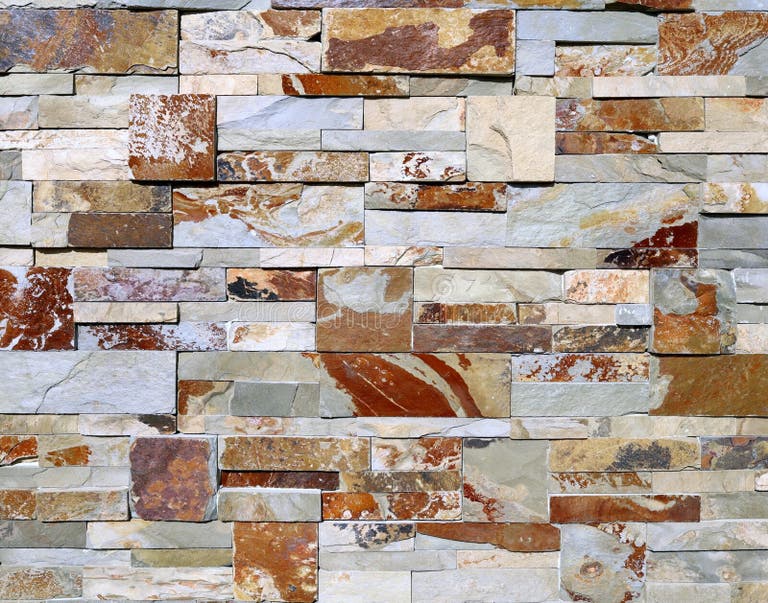 Stone Cladding Wall Made of Different Shaped Bricks of Multicolor Rocks ...