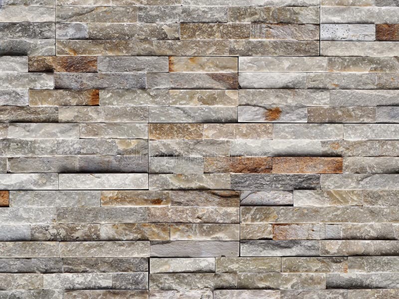 Stone Wall Cladding Made Of Horizontal Gray Brown And