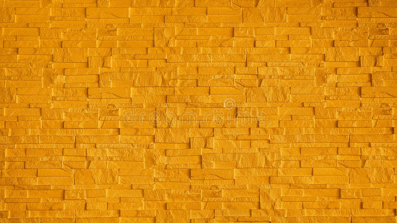 Stone Cladding Wall Made of Regular Gold Yellow Bricks. Abstract Wall ...
