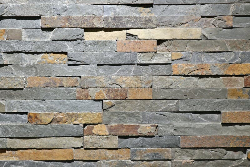 Stone Cladding Wall Made of Striped Stacked Slabs of Natural Rocks ...