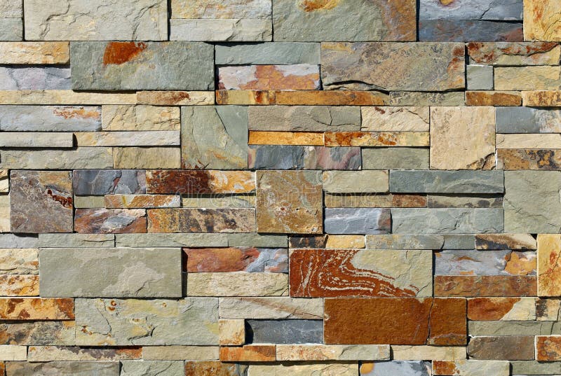 Stone Cladding Wall Made of Stacked Slabs of Natural Multicolor Rocks ...