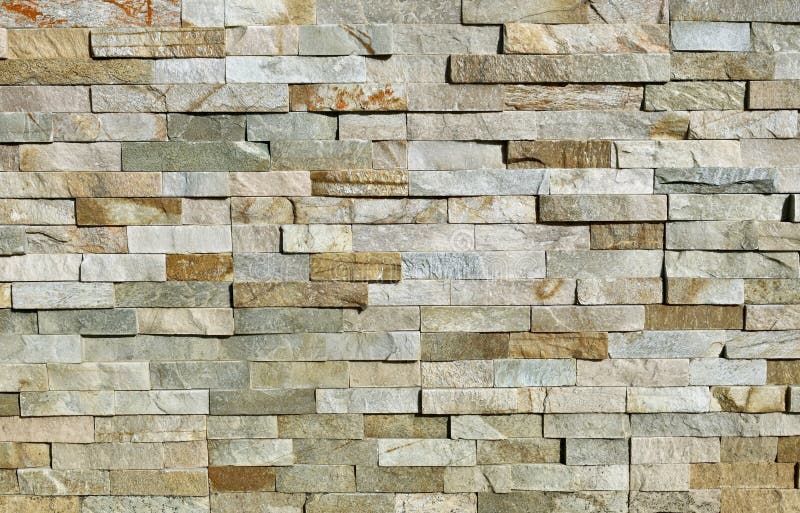 Stone Cladding Wall Made of Striped Stacked Bricks of Rocks. External ...