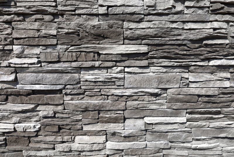 Stone Cladding Wall Made of Striped Stacked Slabs of Gray and Black ...