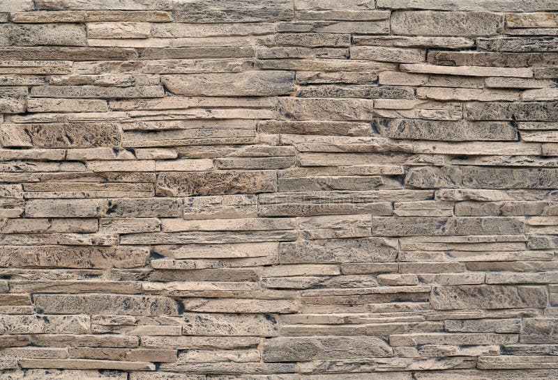 Stone Cladding Wall Made of Striped Stacked Slabs of Natural Rocks ...