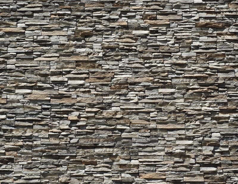 Stone Cladding Wall Made of Striped Stacked Slabs of Natural Gray Rocks ...