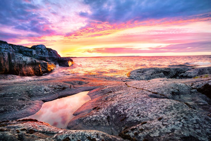 Stone coast of the island stock image. Image of lake - 76375197