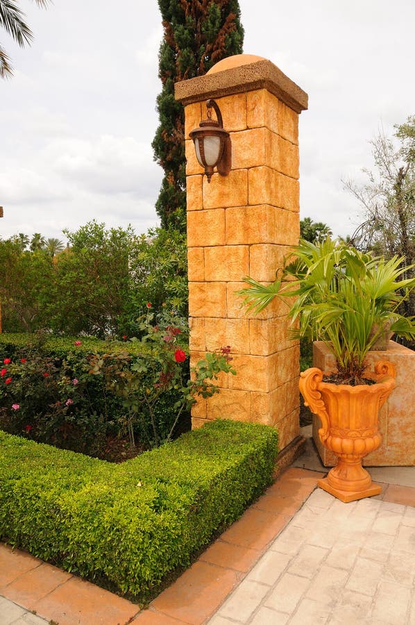 Stone column in a garden stock photo. Image of stone - 12592412