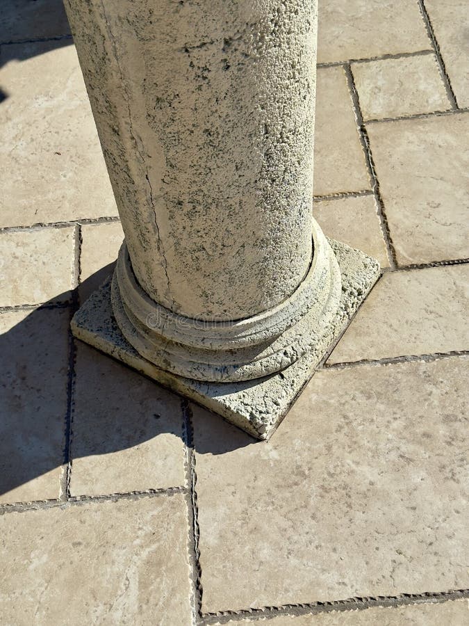 Stone Column with Square Base on Tile Floor, Sunlight Stock Image ...