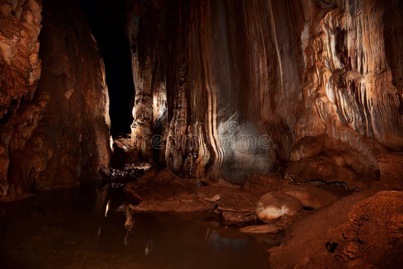 Stone columns in a cave stock photo. Image of column - 31295526