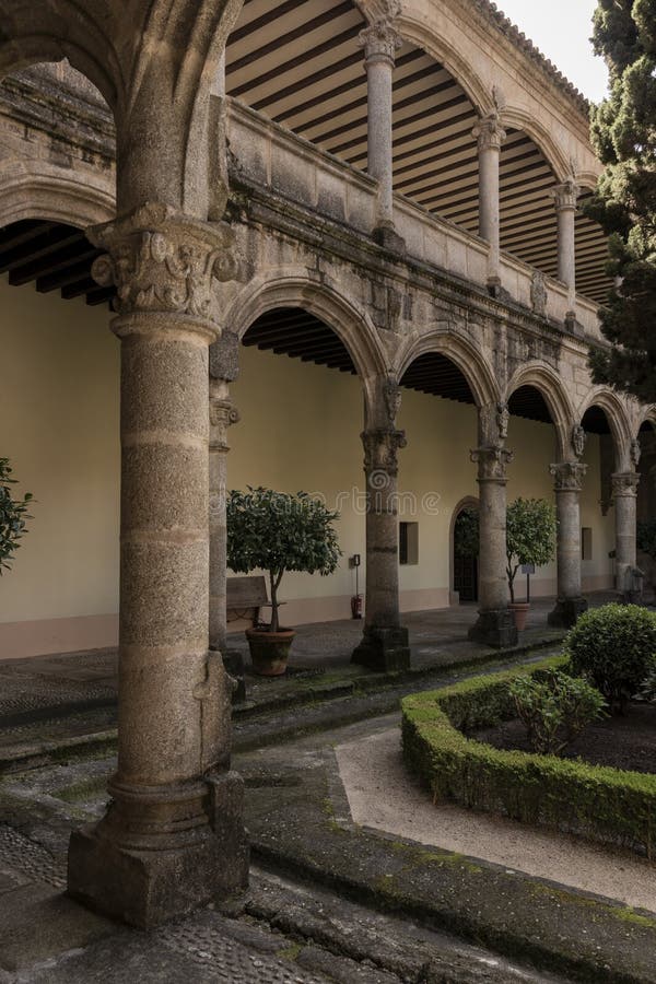 Stone Columns Supporting Arches in Monastery Courtyard with Garden ...