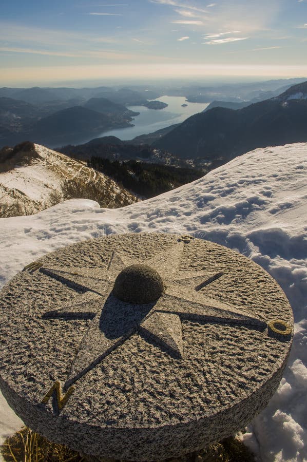 Stone Compass Rose Set within a Stone Star. Golden Coloured Paving Sla ...
