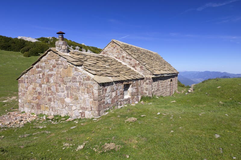 Stone cottage stock photo. Image of meadow, idyllic, mountainous - 15352158