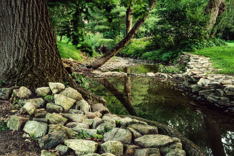Stone Covered Stream Edge and Stream Stock Image - Image of camp ...