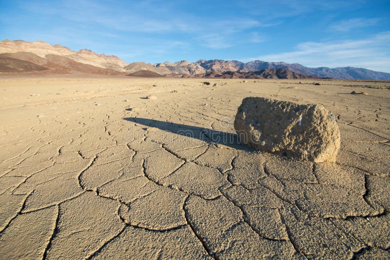 Stone on Cracked Ground at Death Valley National Park Stock Photo ...
