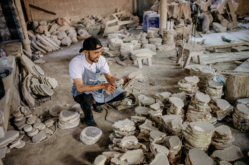 Stone Craftsman in Apron Squatting Smoothing Stone Slabs Arranged Stock ...