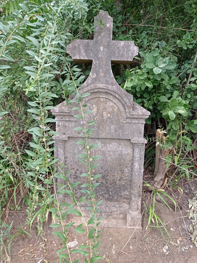 Stone cross in a cemetery stock photo. Image of memorial - 249144488