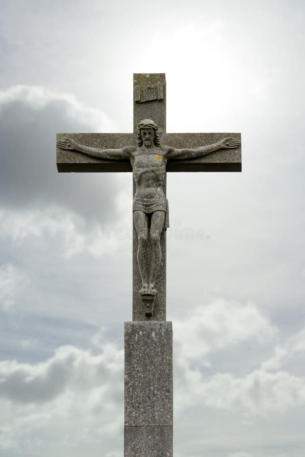 Stone Crucifix with Jesus Christ before Cloudy Sky Stock Photo - Image ...