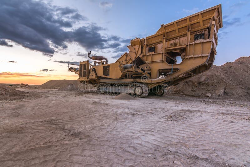 Stone Crusher Machine in a Quarry or Open-pit Mine, To Transform into ...