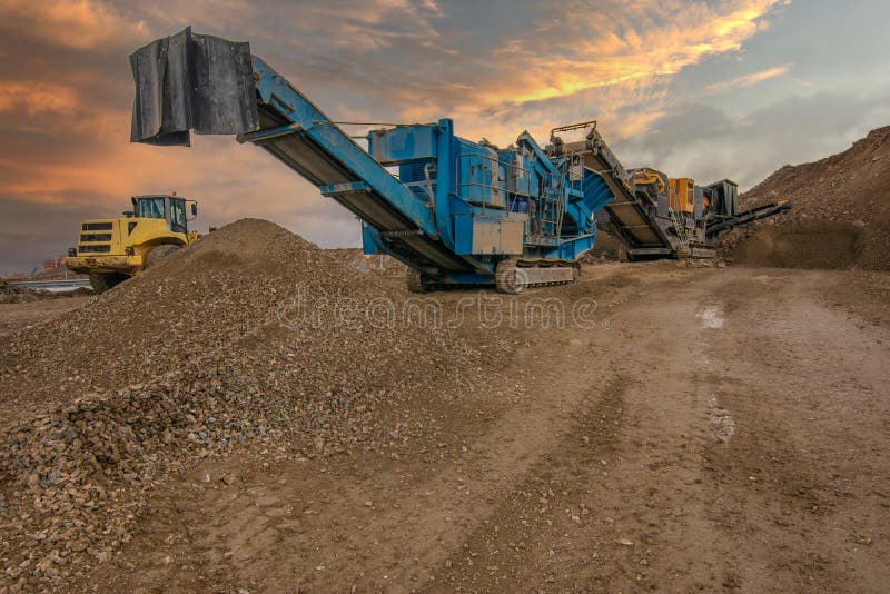 Stone Crusher Machine in a Quarry or Open-pit Mine, To Transform into ...