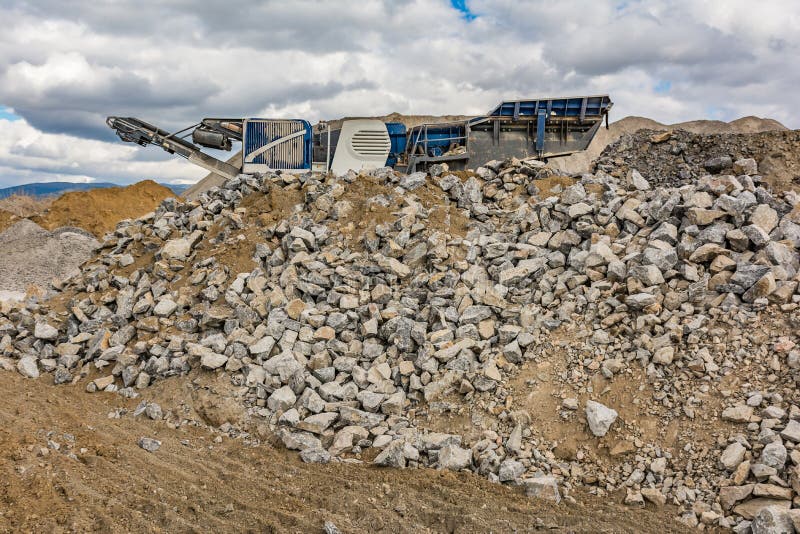 Stone Crusher Machine in a Quarry or Open-pit Mine, To Transform into ...