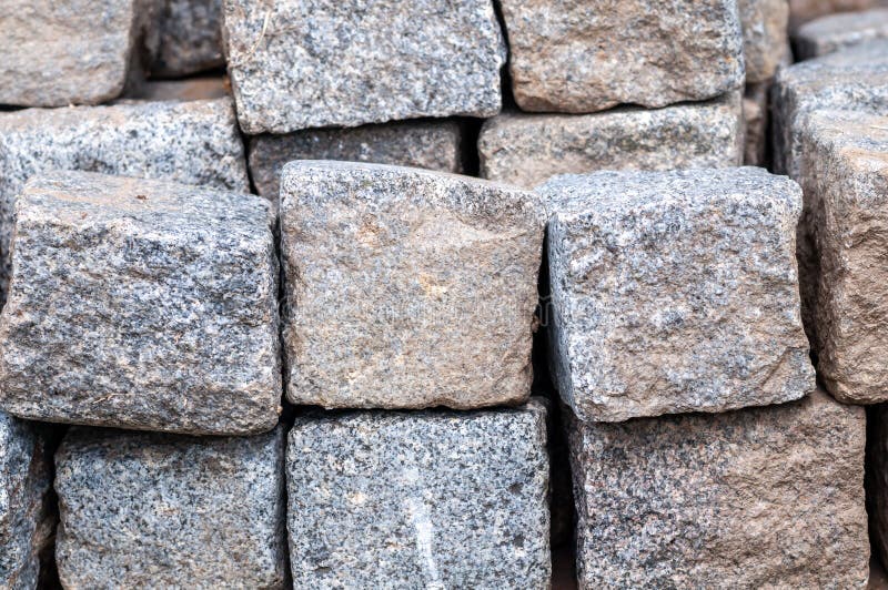 Stone cubes in a pile stock image. Image of cubes, grey - 276047741