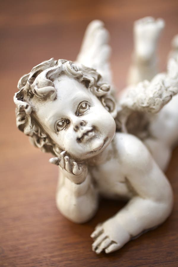 Stone cupid doll stock image. Image of christian, sign - 39721865