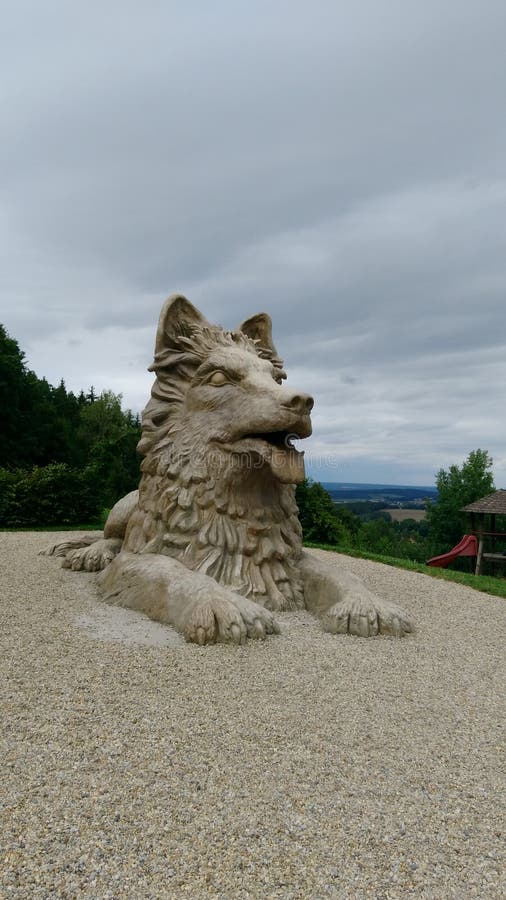 Stone dog stock photo. Image of greenery, forest, overcast - 99099854