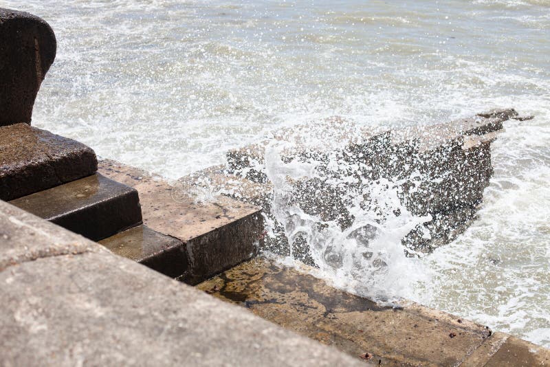 Stone Edge of a Fountain with Water Splashing Stock Photo - Image of ...
