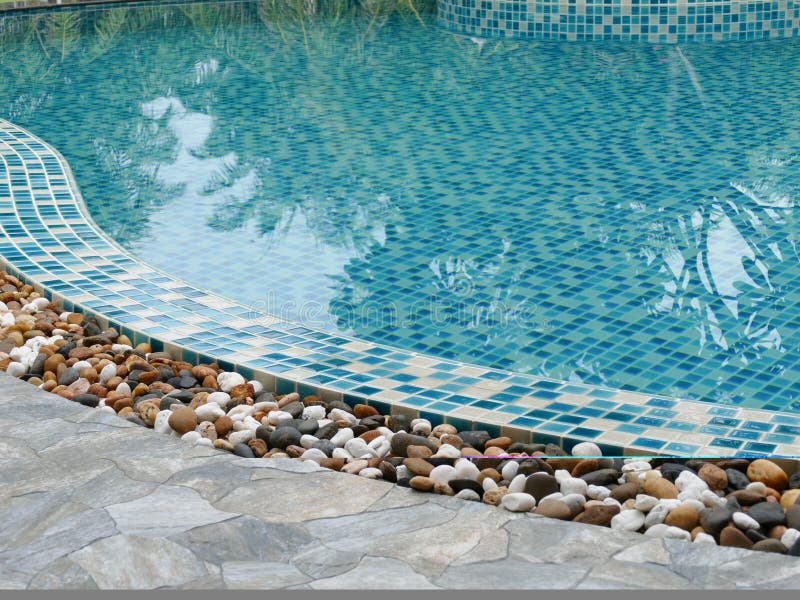 Stone on the Edge of the Swimming Pool Stock Image - Image of tiles ...