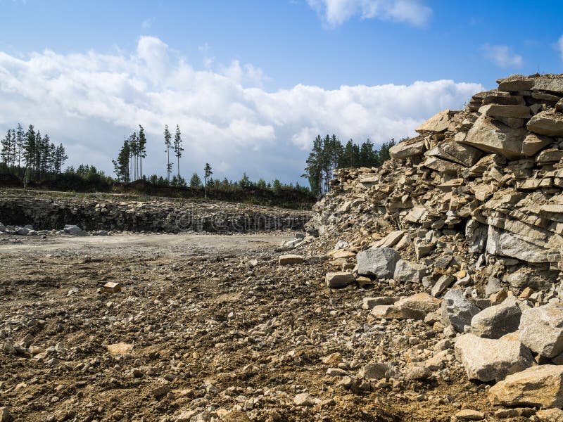 Stone Extraction from Quarry Artificial. Excavator Working in the Pit ...