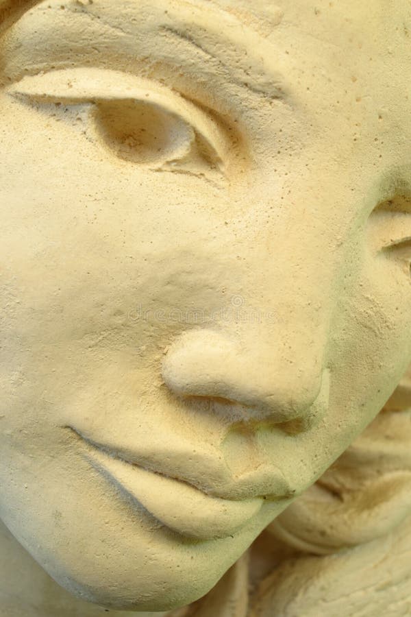 Closeup of Indian Woman Statue Face with Closed Eyes and Ultraviolet ...