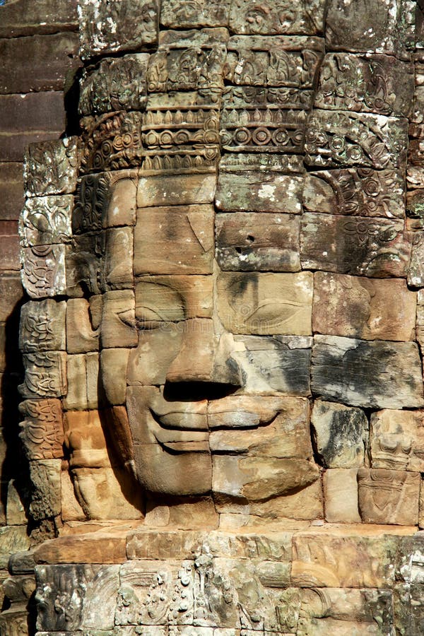 Stone face in Angkor Wat stock image. Image of archeology - 37587953