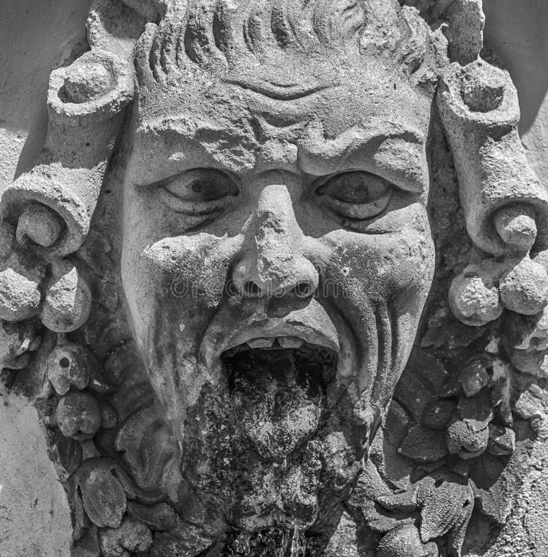 Fountain with the Face of a Greek Statue. Located in the Greek Park of ...