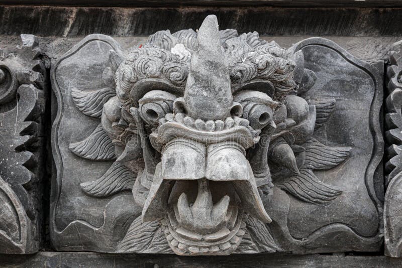 Stone Face Sculpture in Wall at Bali Indonesia Stock Image - Image of ...