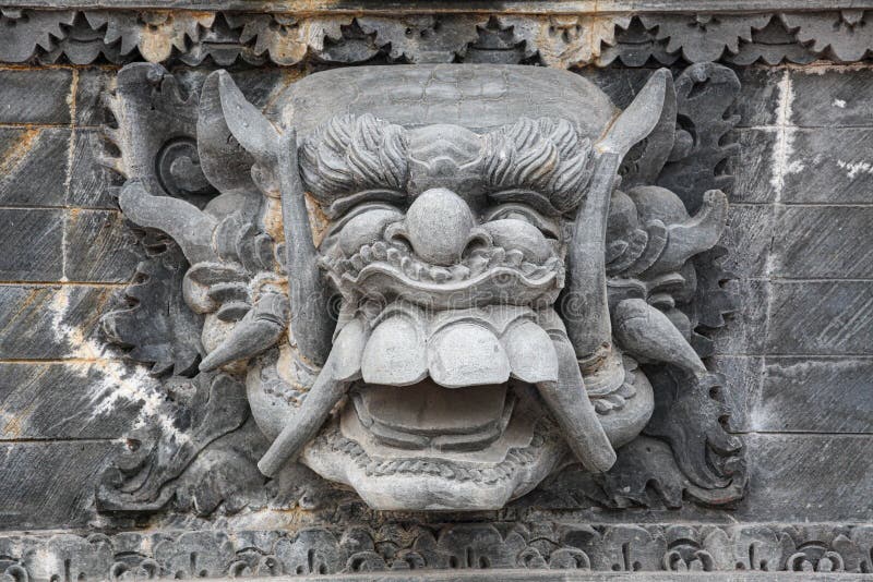 Stone Face Sculpture in Wall at Bali Indonesia Stock Image - Image of ...