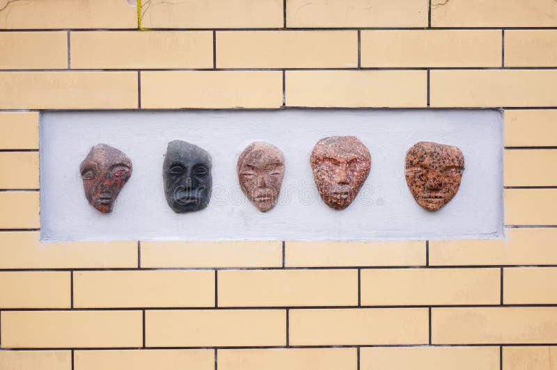 Stone faces stock image. Image of stone, symbols, yellow - 36261567