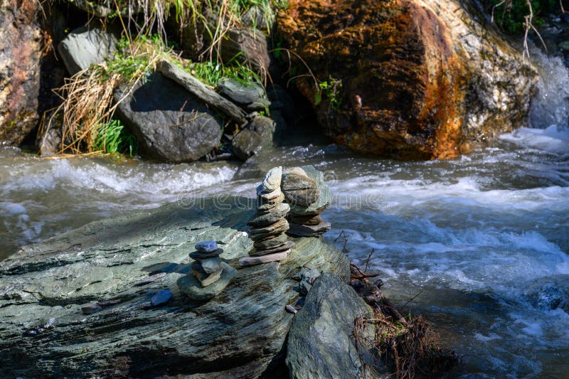 Stone figures in the river stock photo. Image of mountain - 343212434