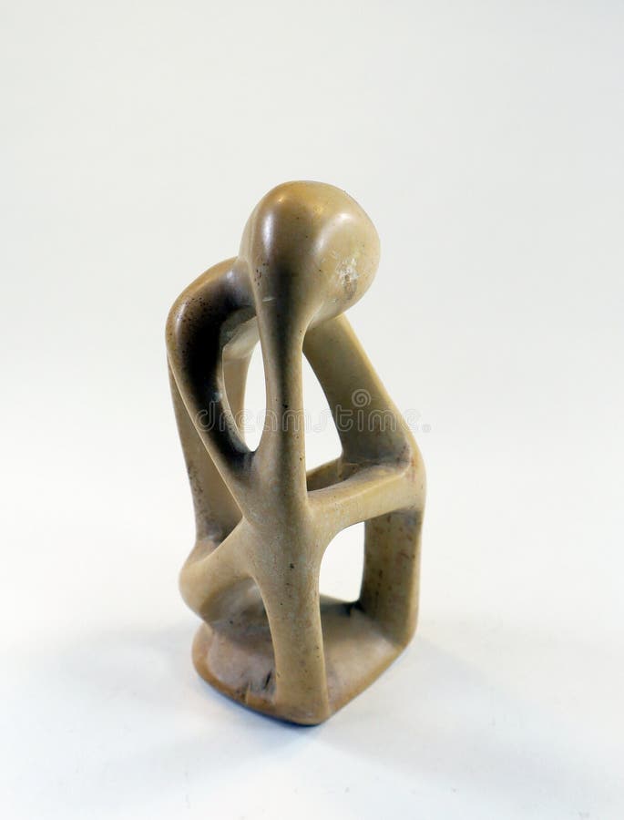 Stone Figurine of a Sitting and Thinking Man, Isolated on White ...