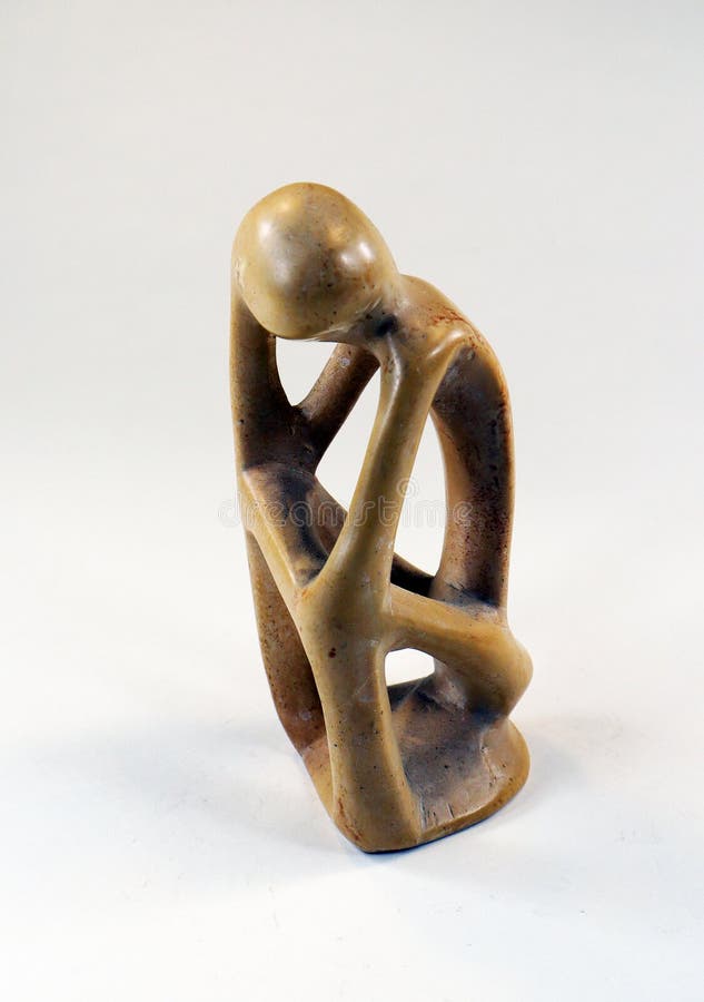 Stone Figurine of a Sitting and Thinking Man, Isolated on White ...