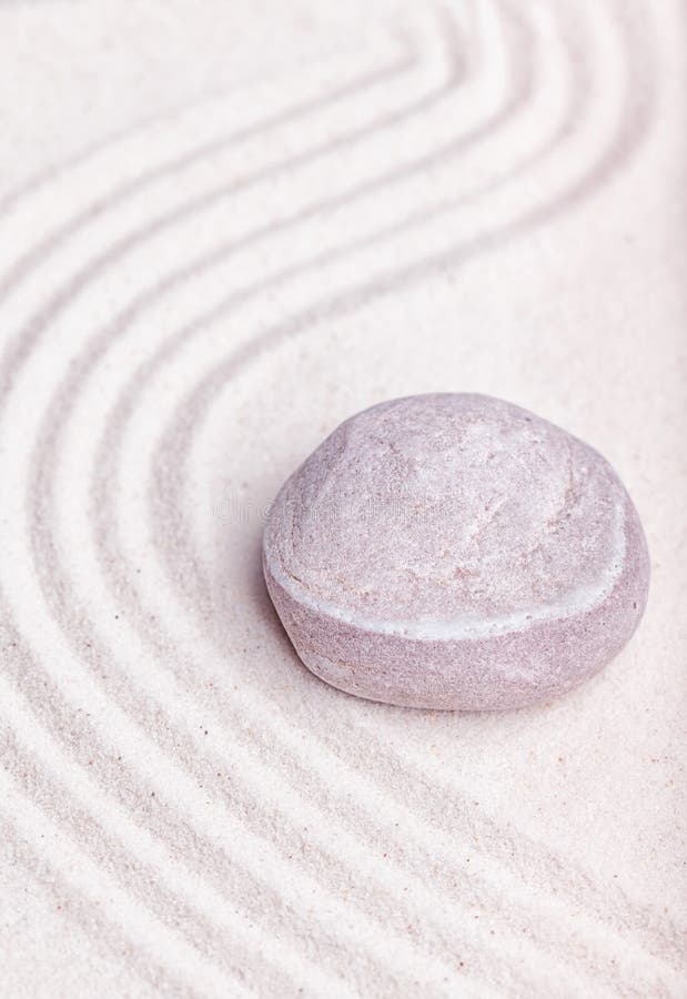 Zen Garden with a Wave Lines in the Sand with Relaxing Black Stones ...