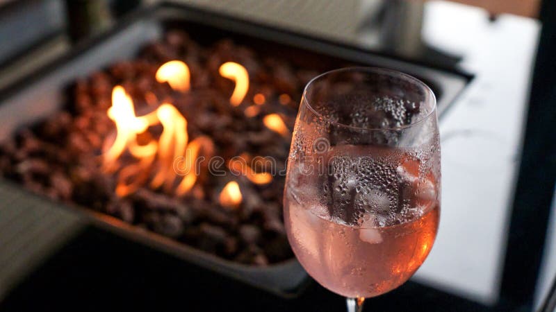 Stone Firepit with Fire Flames and Glass of Wine. Summer Camping ...