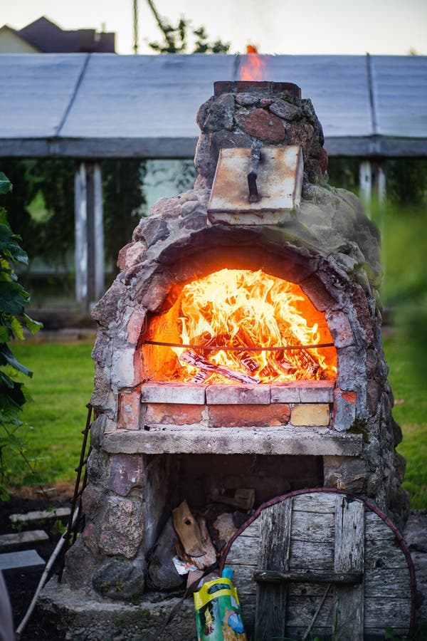 Stone fireplace with fire stock image. Image of natural - 134192879