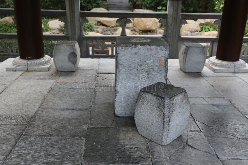 On the Stone Floor of an Outdoor Garden, There are One Square and Two ...